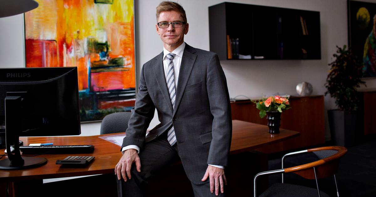 Bankboss John Fisker er glad for sit første fusionsregnskab - men der ...